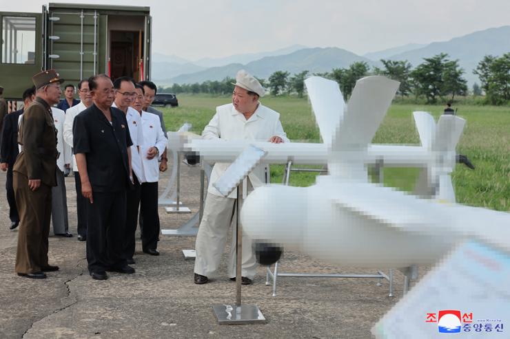 North Korea's Kim Jong Un Oversees Tests of New 'Suicide Drones'