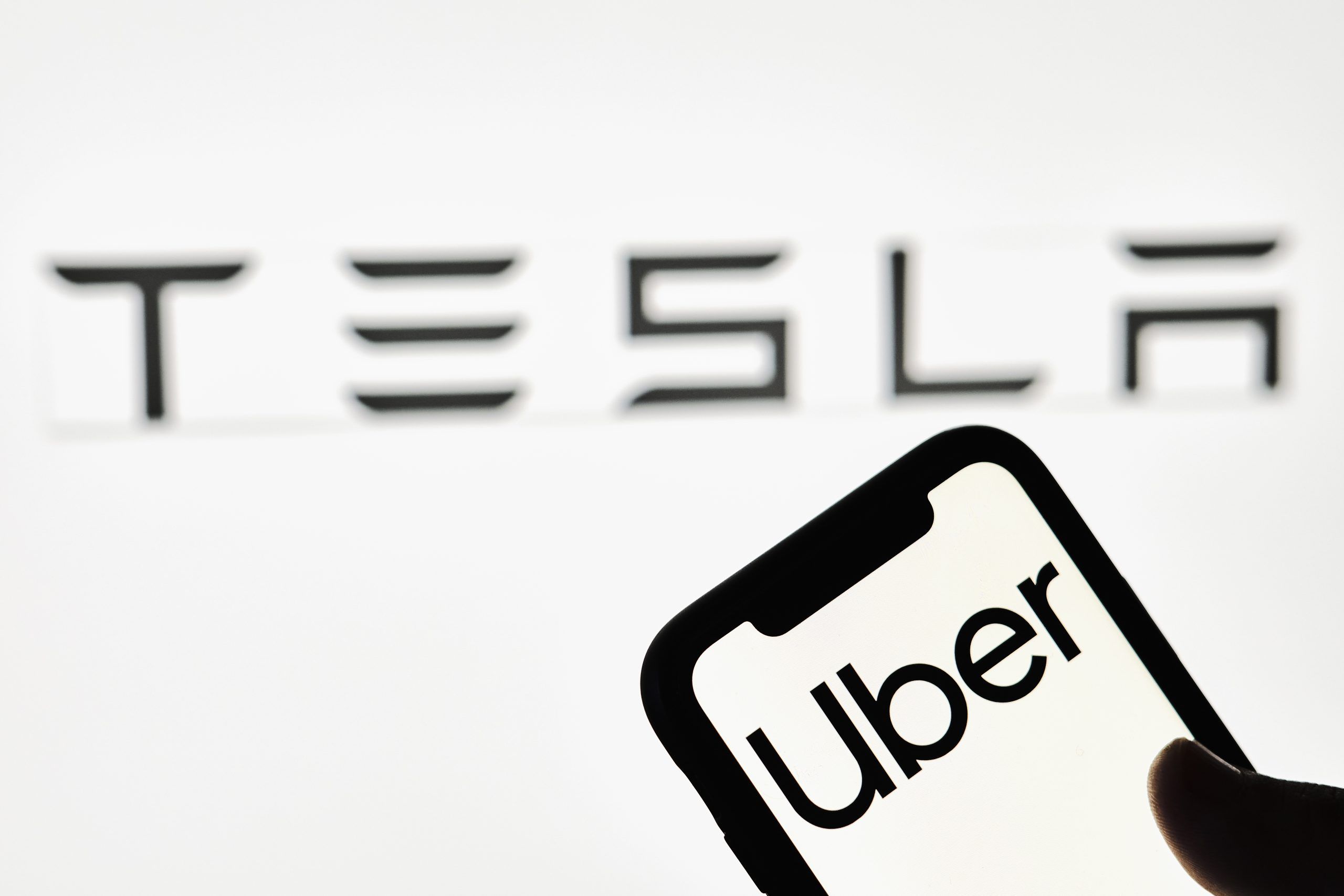 Uber CEO Welcomes Tesla's Robotaxi Entry, Emphasizing Collaboration in ...